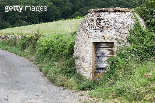 Old and typical stone hut called cadole in french language in the ...