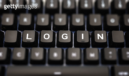 Login online concept. Login text written on keypad. Black keys with ...