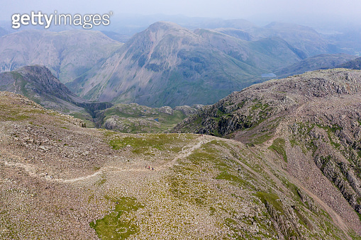 Aerial view of hiking trails on rugged mountains (Scafell Pike and ...