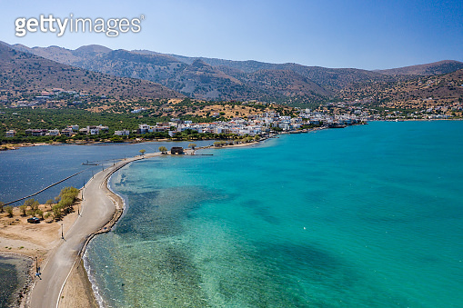 Aerial view showing the causeway connecting Elounda to Kolokitha island ...