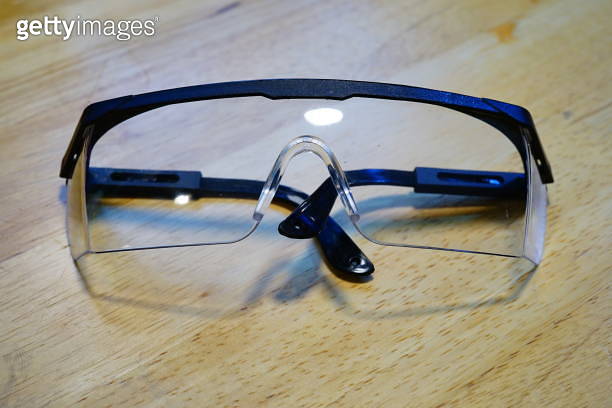 Folded pair of safety glasses 이미지 (1279858662) - 게티이미지뱅크