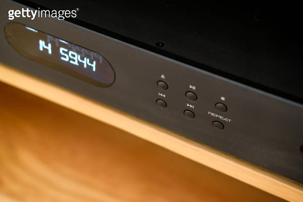 Close-up of the buttons on a high-end, slot loading music CD player ...