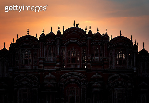 Silhouette of Hawa Mahal palace with monkey at sunset, Jaipur ...