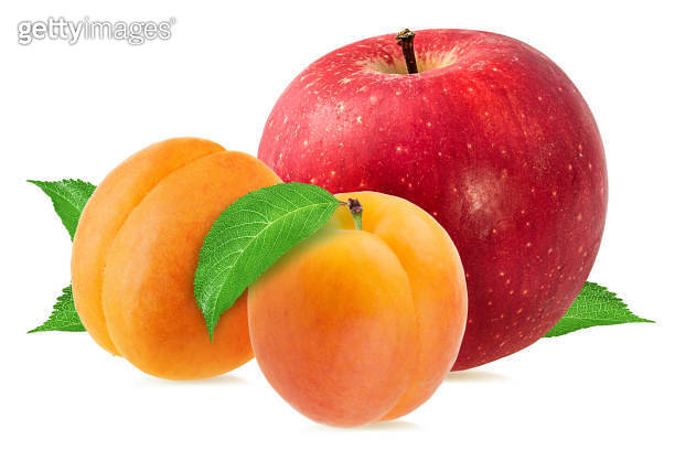 Apricots with red apple isolated on white background with clipping path ...