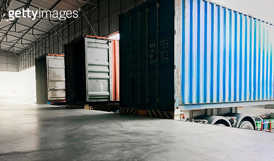 Container truck docking load cargo shipment at the warehouse. Road ...