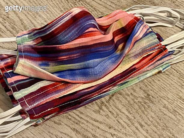 Colorful handmade protective face masks made from old clothing 이미지 ...