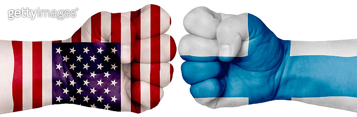 Two hands are clenched into fists and are located opposite each other ...