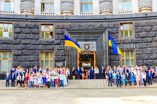 Ukrainian officials and ministers near the Building of Cabinet of ...
