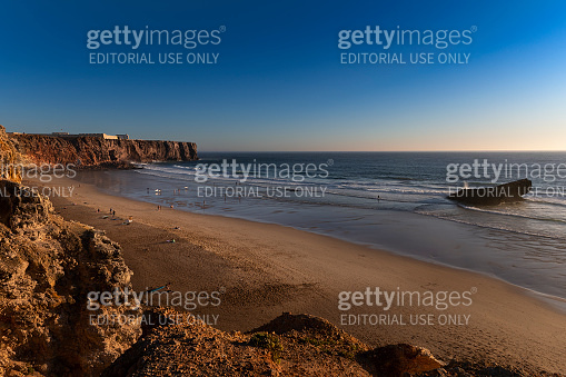 People at the Tonel Beach (Praia do Tonel) on a summer day, in Algarve ...