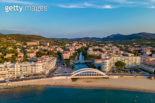 Aerial view of Sainte-Maxime seafront and its famous bridge in French ...