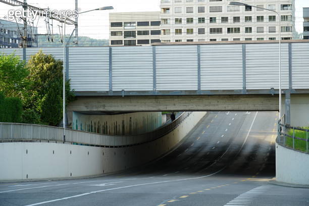 Railway bridge with traction lines and constructions as well as a noise ...