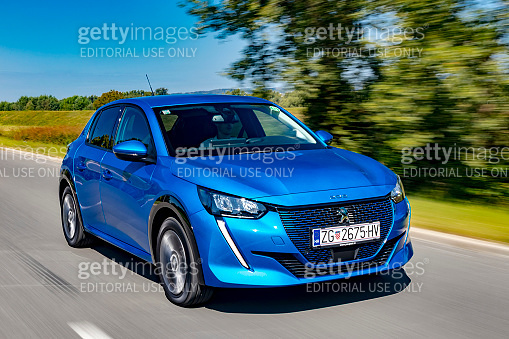 New Peugeot e208 driving 이미지 (1292793730) - 게티이미지뱅크