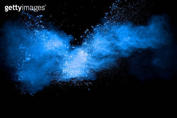Blue powder explode cloud on black background.Launched blue dust ...