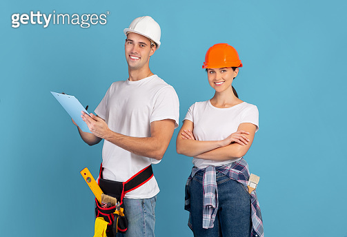 Repairment Budget Planning. Portrait Of Man And Woman Repair Masters In ...