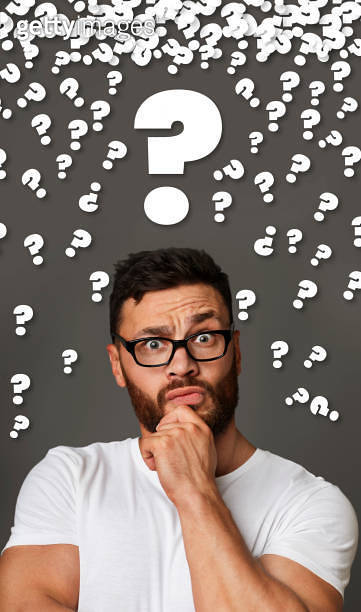 Bearded guy with glasses feeling puzzled, collage with question marks ...