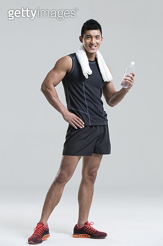 Male athlete with a bottle of water 이미지 (a10743823) - 게티이미지뱅크