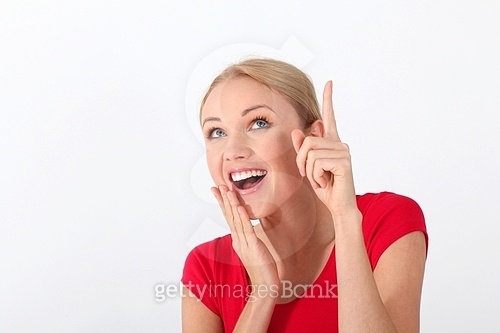 Portrait of beautiful blond woman with interrogative look (a10846369 ...