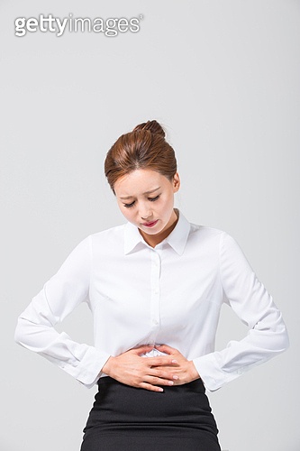 Korean, office worker, woman, pain 이미지 (jv10916135) - 게티이미지뱅크