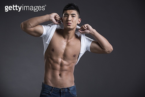 Portrait of young Chinese muscular man 이미지 (a11095072) - 게티이미지뱅크
