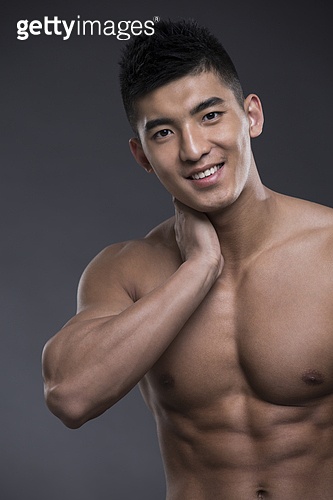 Portrait of young Chinese muscular man 이미지 (a11095111) - 게티이미지뱅크