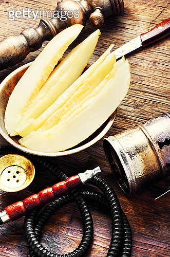 Oriental hookah with the aroma melon for relax.Melon shisha. oriental ...