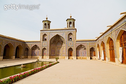in iran the old mosque and traditional wall tile incision near minaret ...