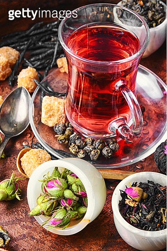 large variety black tea,green tea,rose tea in a copper tray. Tea cup ...