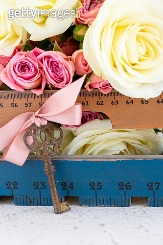 antique skeleton key and fresh rose flowers. vintage key and flowers ...