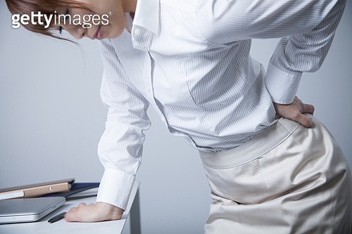 Low back pain OL 이미지 (jv12329989) - 게티이미지뱅크