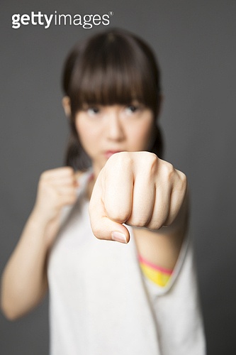 Woman Punching 이미지 Jv12355750 게티이미지뱅크