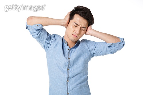 Young man hands over his ears 이미지 (vs12400771) - 게티이미지뱅크
