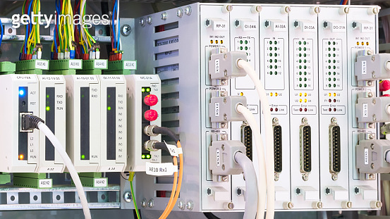 View of communication port module on PLC unit in control box of ...