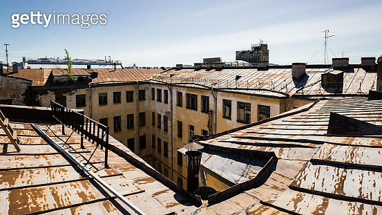 urban pitched rusty roofs. view of historic buildings. view of the city ...