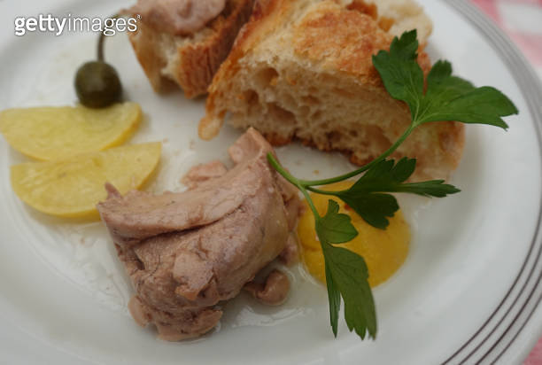 Cooked cod liver preserved in oil and served with candied lemon and big ...