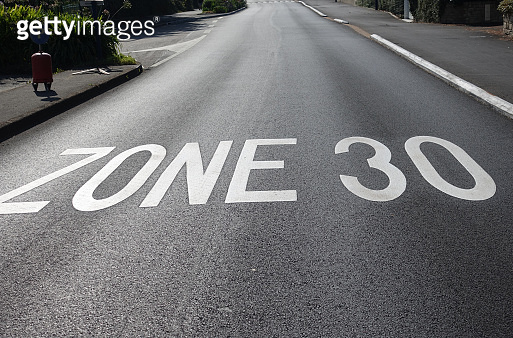 Speed limited to 30km / h in the city Signage marked on the road City ...