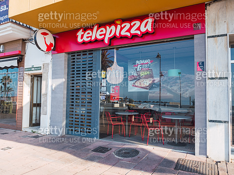 Facade of a fast food restaurant of the spanish franchise Telepizza in ...