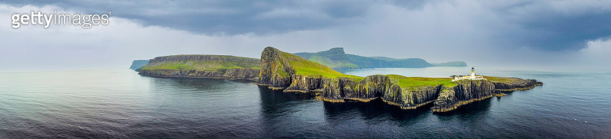 Overcast skies and gathering storm over Point of Neist Light House ...