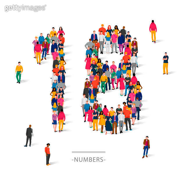 A large group of people is standing in colored clothes in the shape of ...