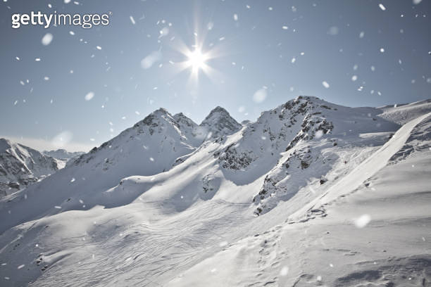 falling snow effect, wonderful winter sports scene in the alps. with ...