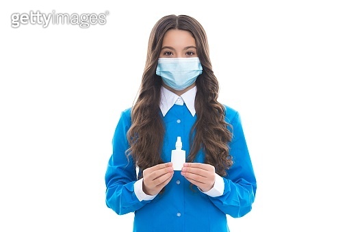 girl in mask hold nasal drops. child presenting nasal spray. runny nose ...