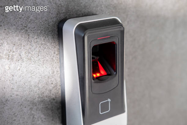 Closeup Fingerprint scanner on the wall in the office space. Modern ...