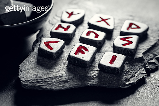 Magic rune stones with red signs based on futhark alphabet (1298280954 ...