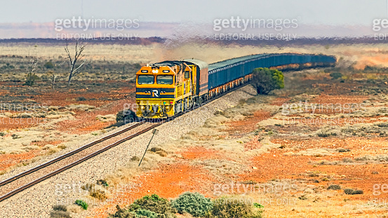 ORA containerised iron ore train in Australia's dry Outback (1353600763 ...