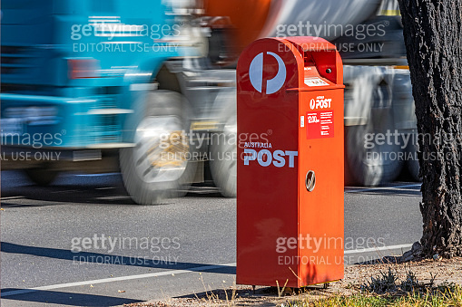 Australia Post Street Posting Box with passing traffic (motion blur) on ...