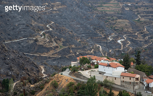 Mountain fire with burned land and disaster on agriculture. Odou ...