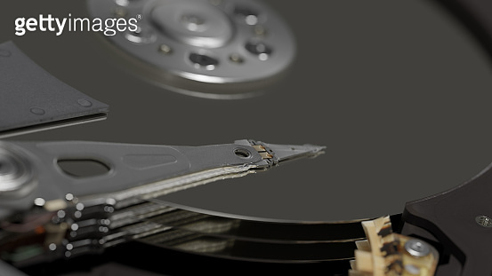 Close-up on a modern HDD or Hard Disk Drive with shallow depth of field ...
