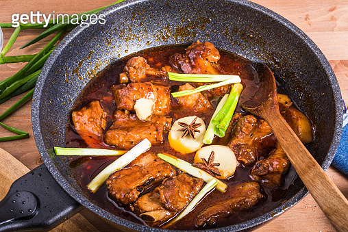 Chinese red braised spare ribs. Braised pork, brisket and ribs in red ...