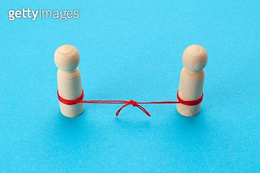 Couple recovery. Two figures of people are connected by a thread ...