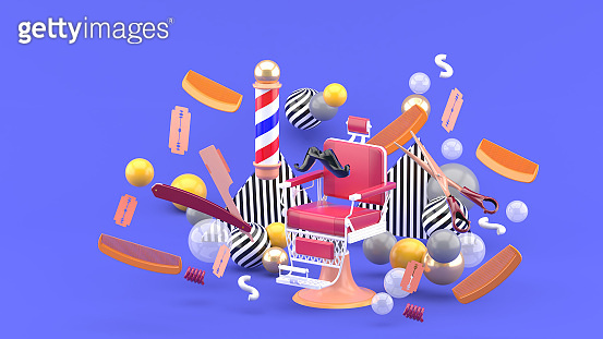 Barber chair and barber accessories among the colorful balls on the ...