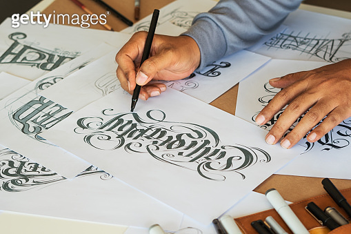 Typography Calligraphy artist designer drawing sketch writes letting ...